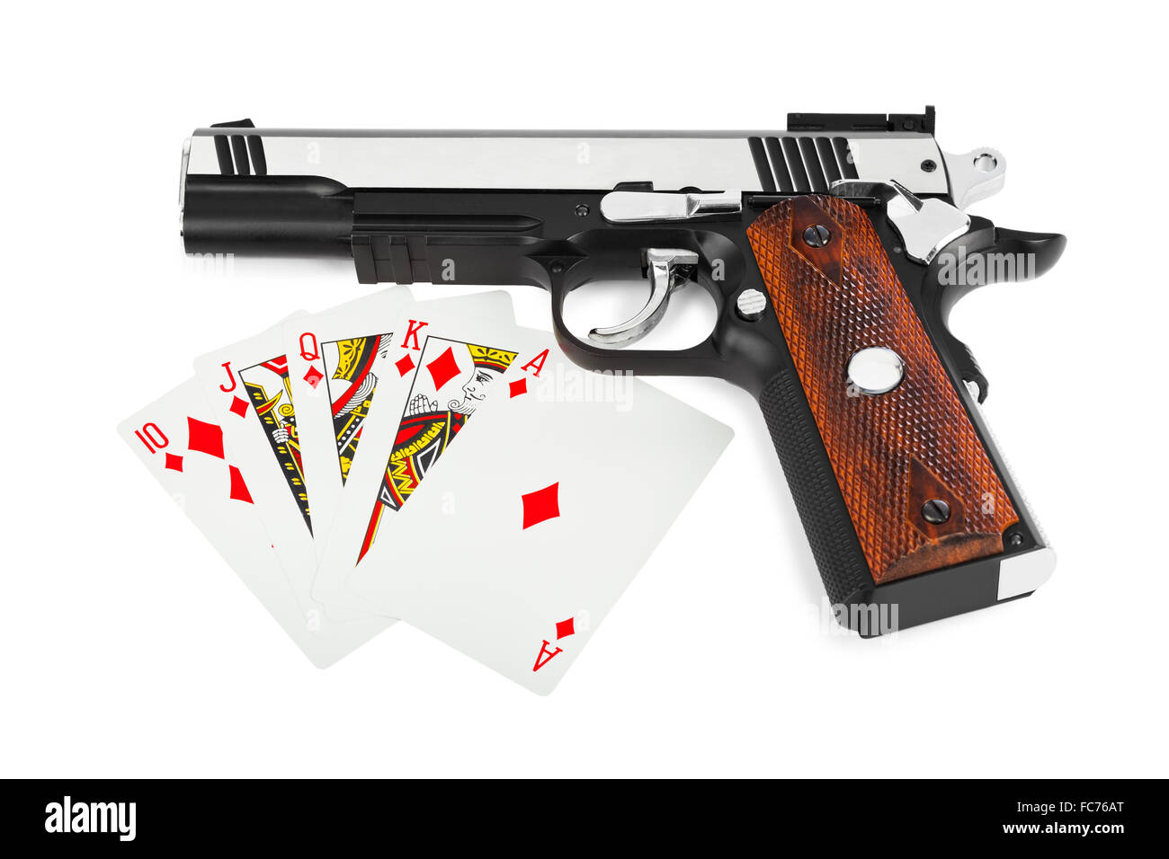 Gun and playing cards Stock Photo - Alamy