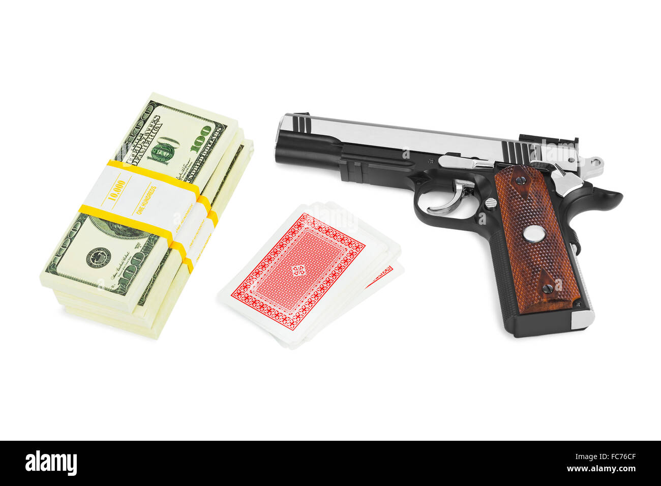 Gun money and playing cards Stock Photo - Alamy