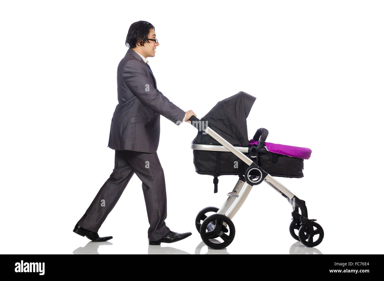 Funny dad with baby and pram on white Stock Photo - Alamy