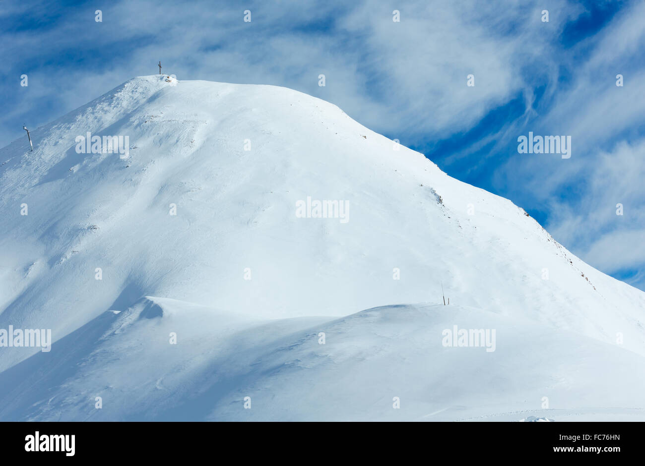 Cross on mount top Stock Photo - Alamy