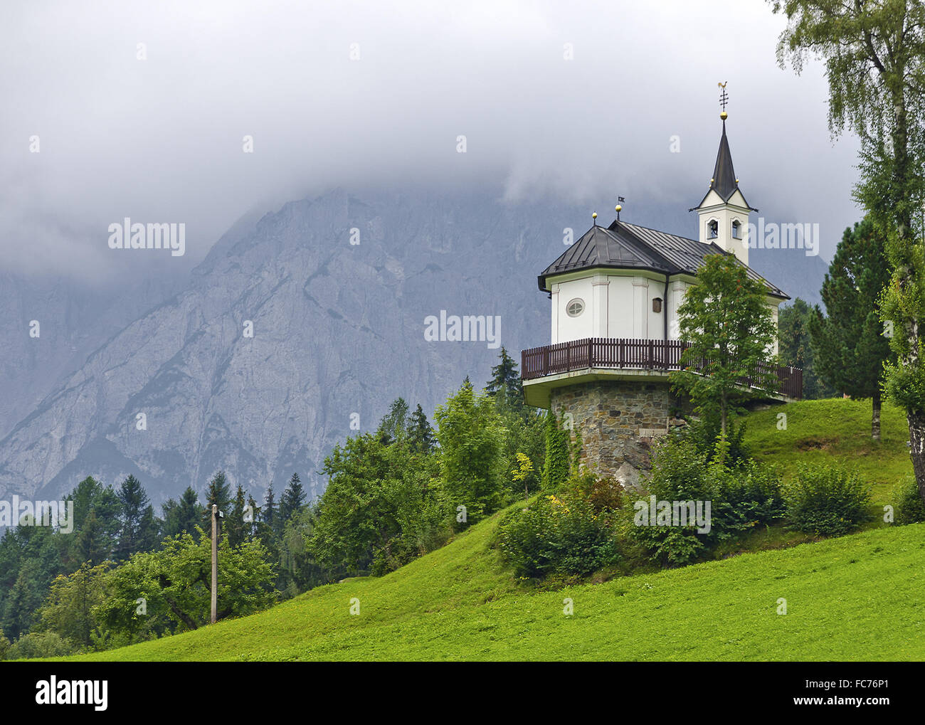 private chapel on a mountain slope Stock Photo - Alamy