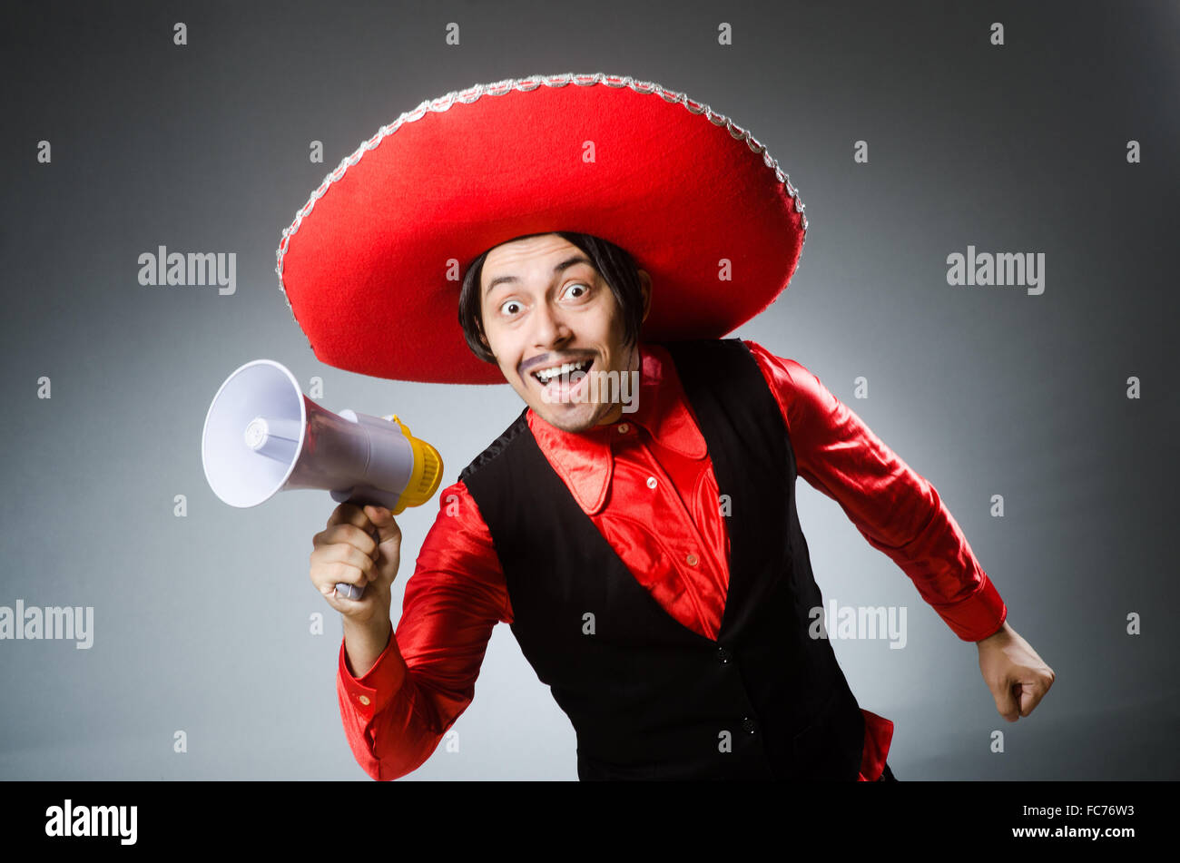 Cheerful positive man with loudspeaker hi-res stock photography and ...