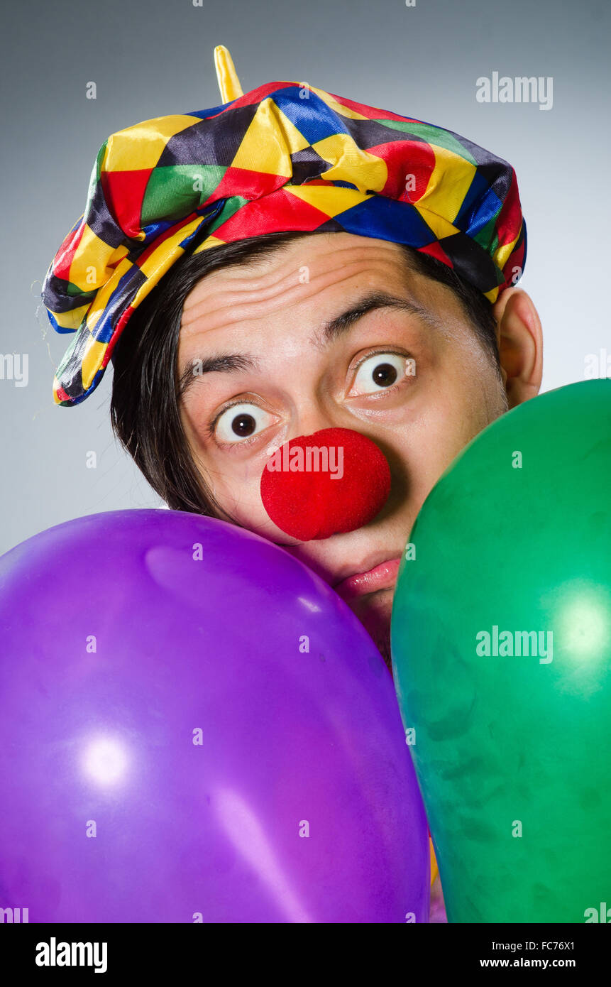 Funny clown in comical concept Stock Photo - Alamy