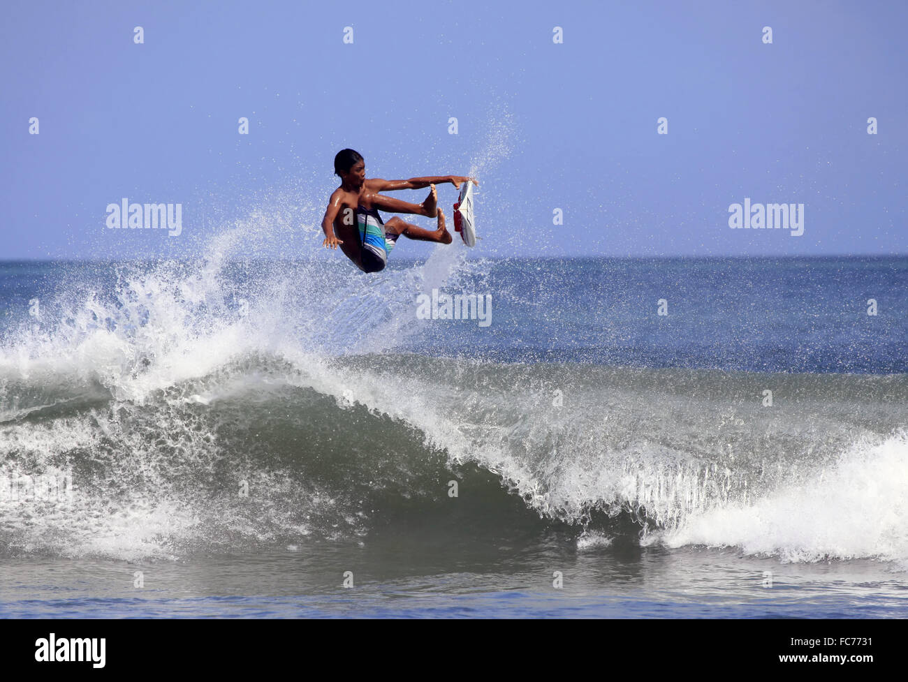 Surfer in ocean Stock Photo - Alamy
