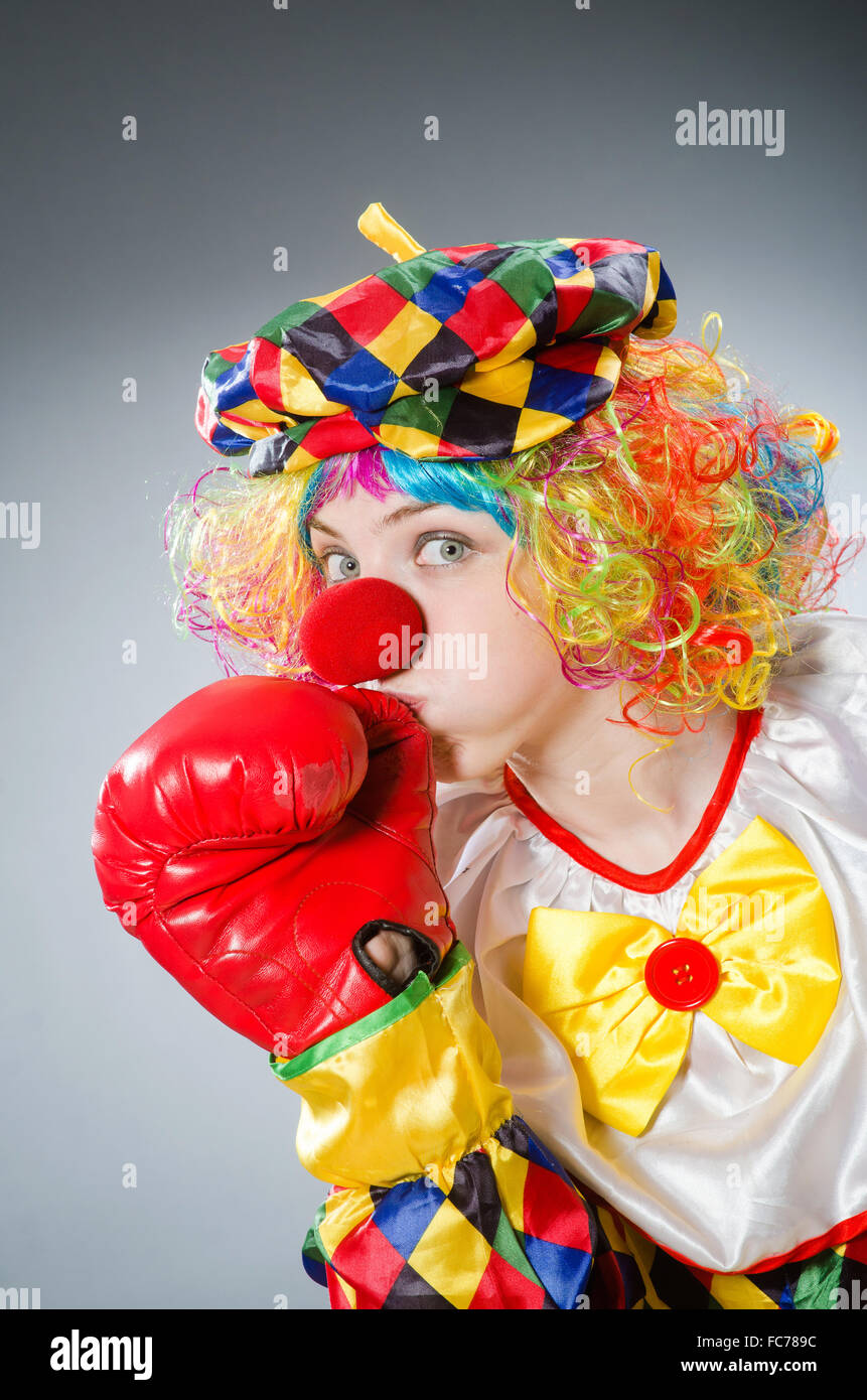 Funny clown in comical concept Stock Photo - Alamy