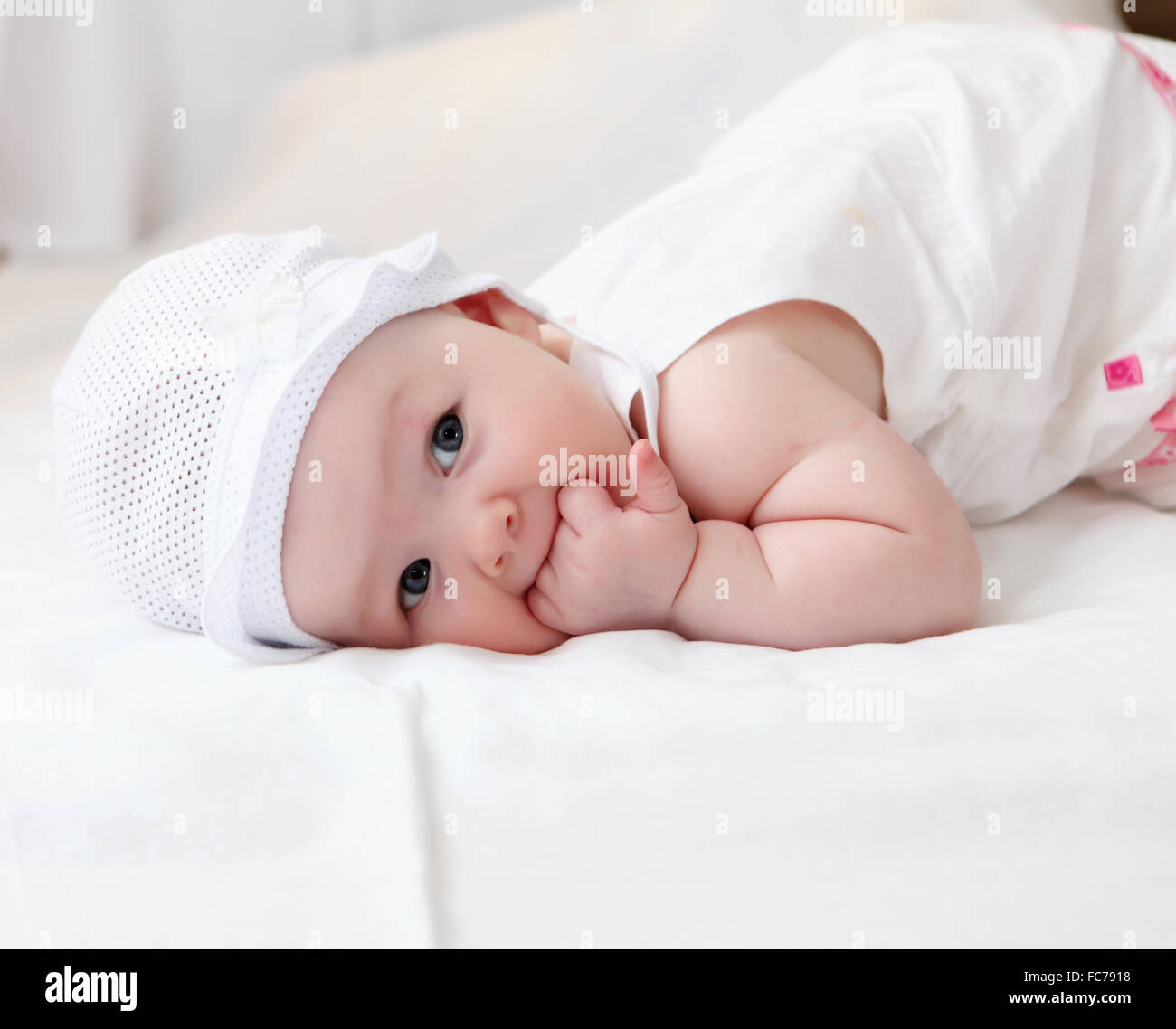 portrait of cute little baby in a funny hat Stock Photo - Alamy