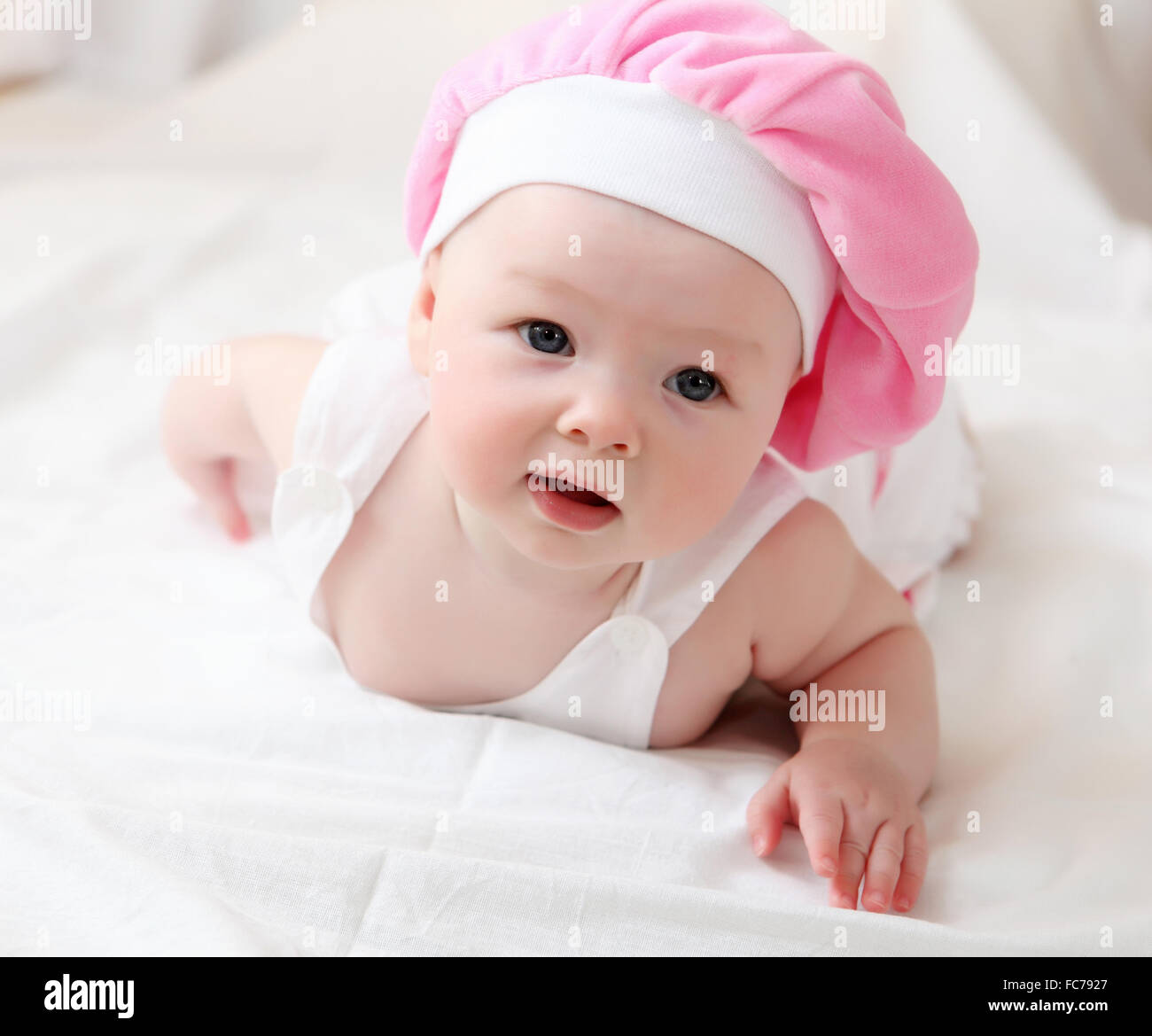 portrait of cute little baby in a funny hat Stock Photo - Alamy