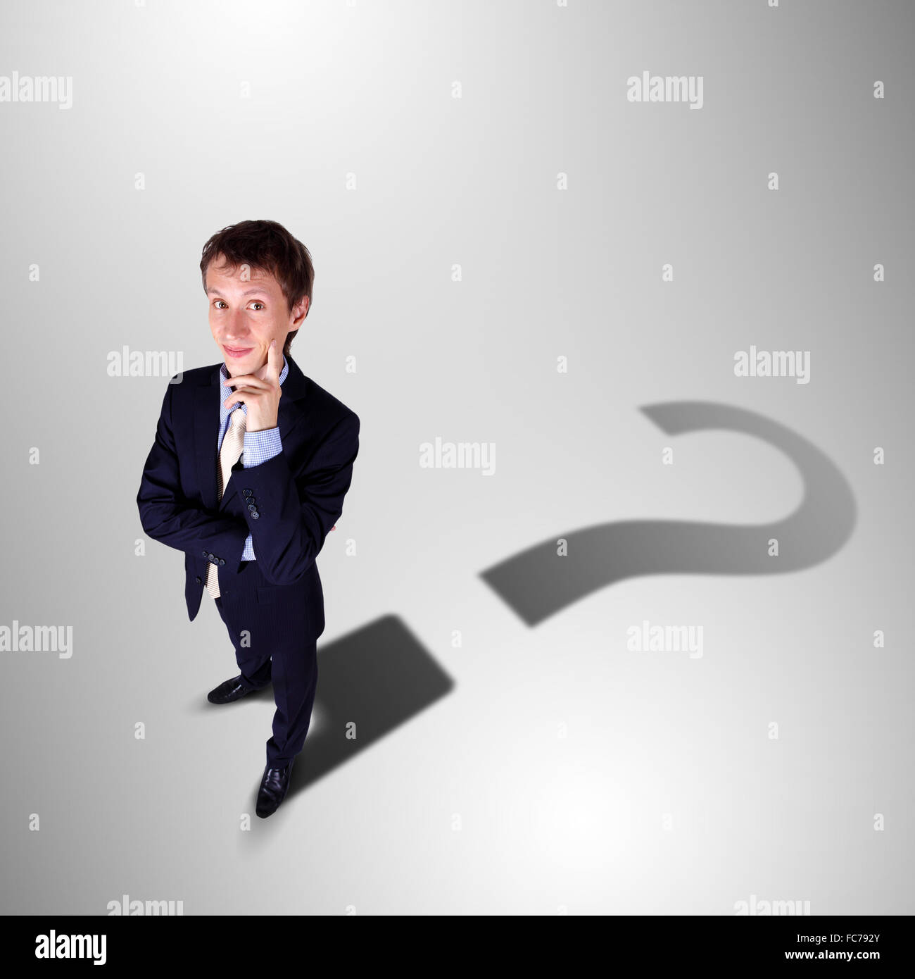 Image of a business man with a shadow shaped as a currency sign Stock ...