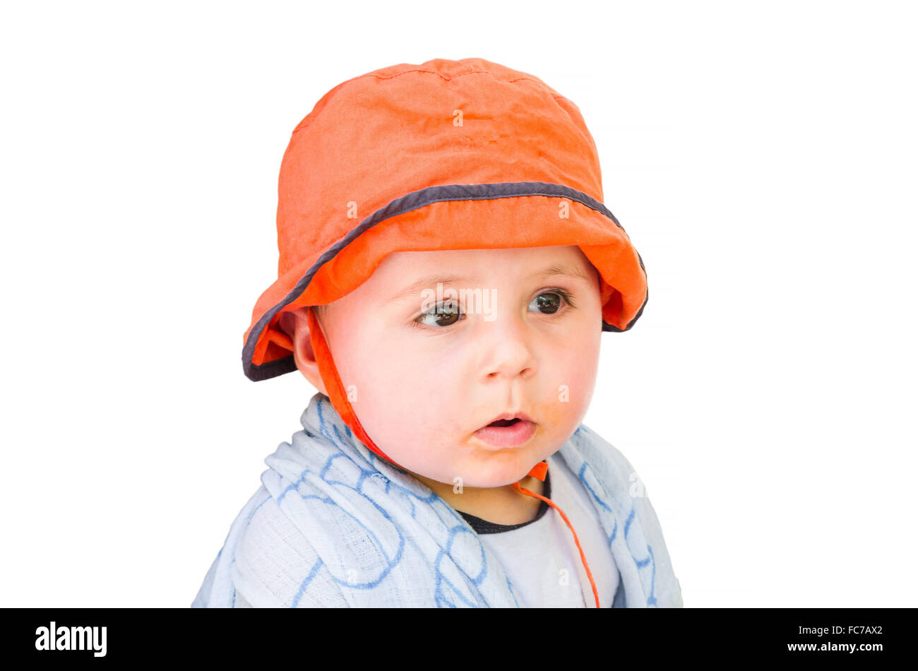 Baby with orange cap Stock Photo - Alamy