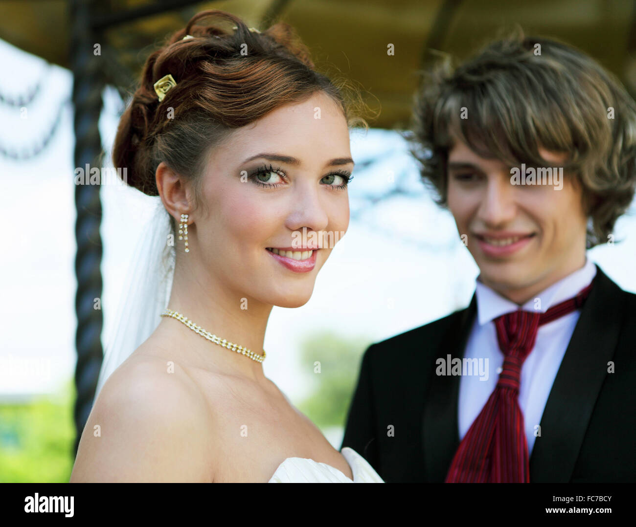 A shot young couples entering into marriage. Portrait of bride and ...