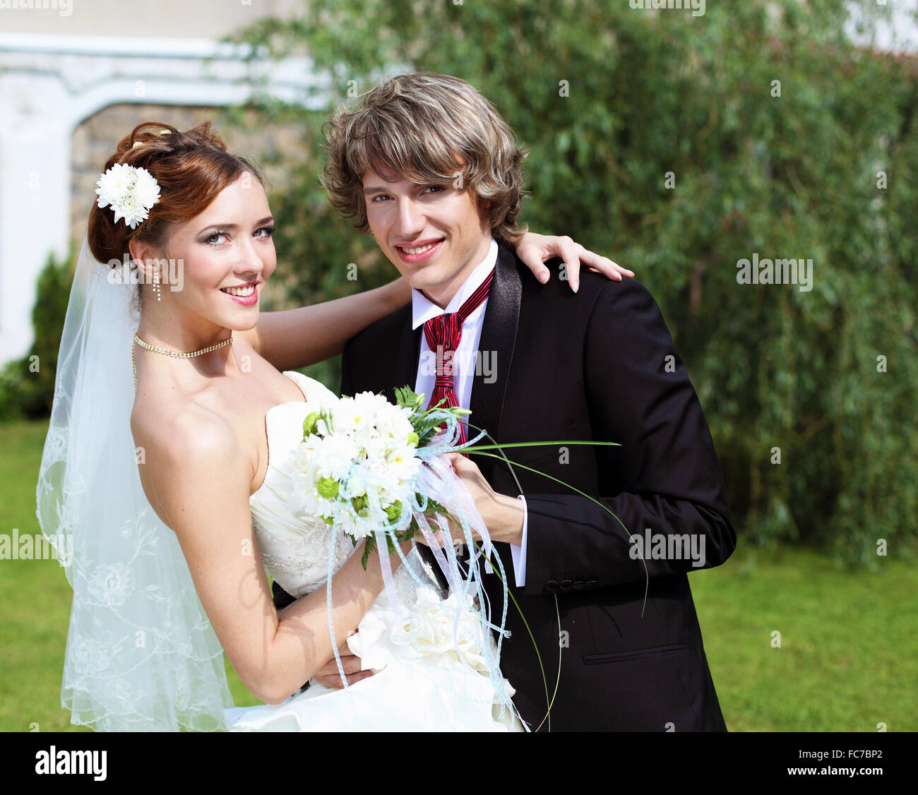 A shot young couples entering into marriage. Portrait of bride and ...