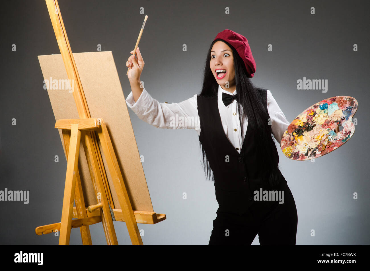 Funny artist working in the studio Stock Photo - Alamy