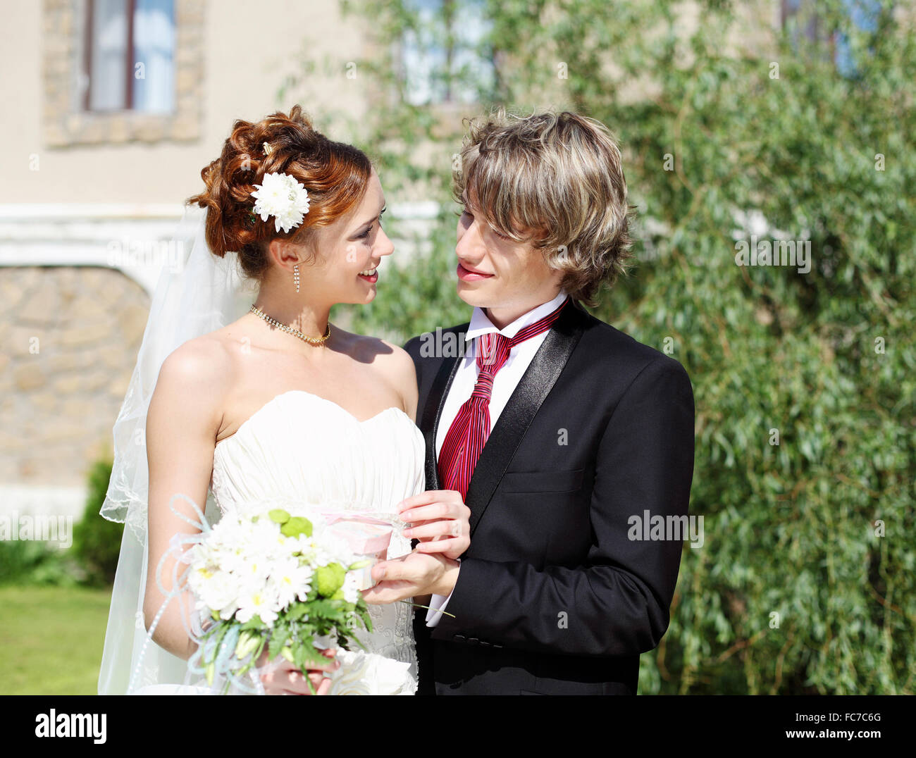 A shot young couples entering into marriage. Portrait of bride and ...