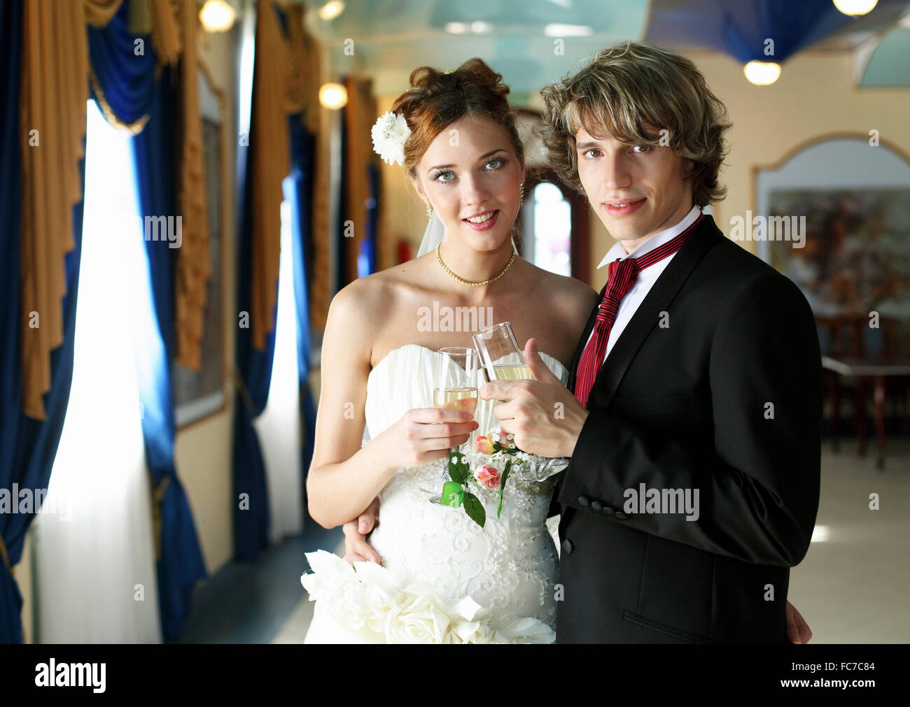 A shot young couples entering into marriage. Portrait of bride and ...