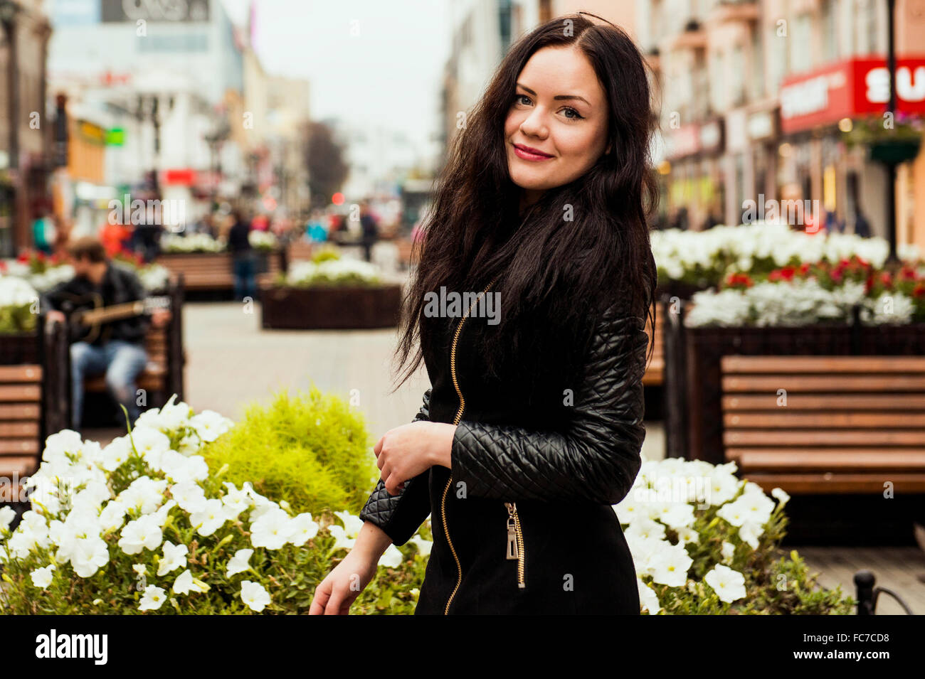 Woman standing outdoors hi-res stock photography and images - Alamy