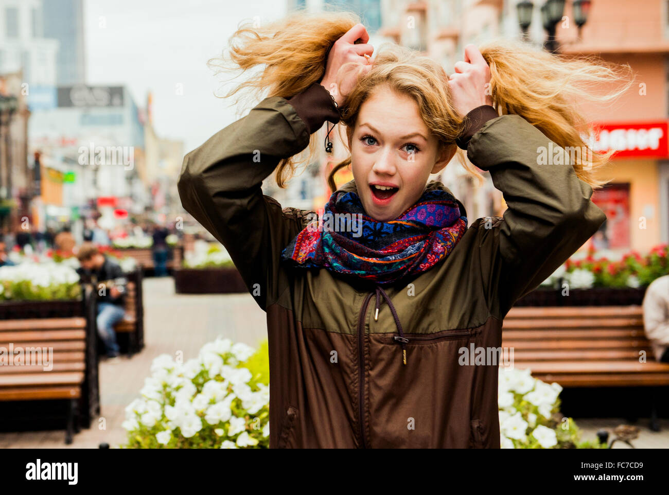Woman standing outdoors hi-res stock photography and images - Alamy