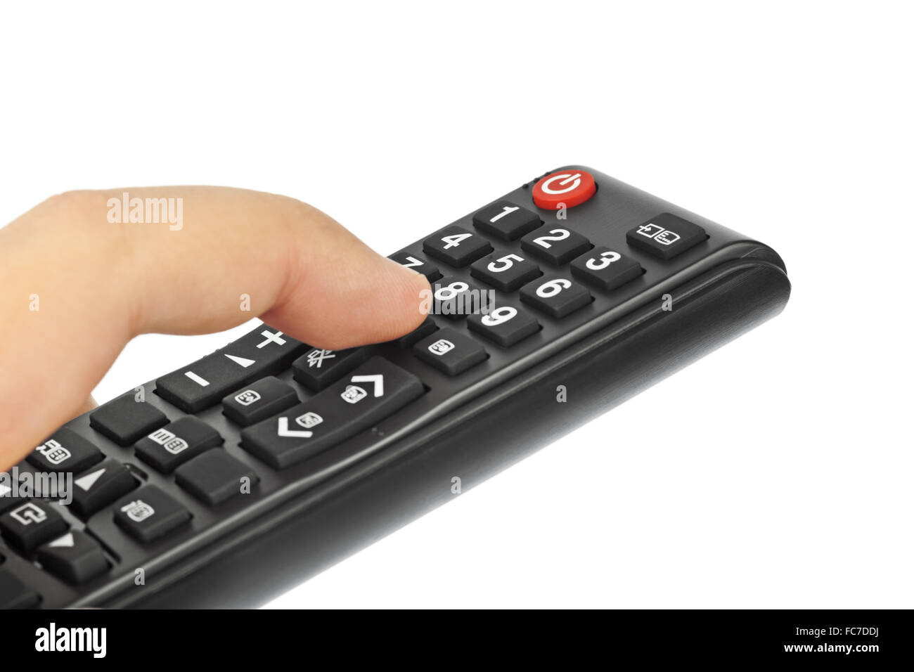 Hand and remote control Stock Photo - Alamy