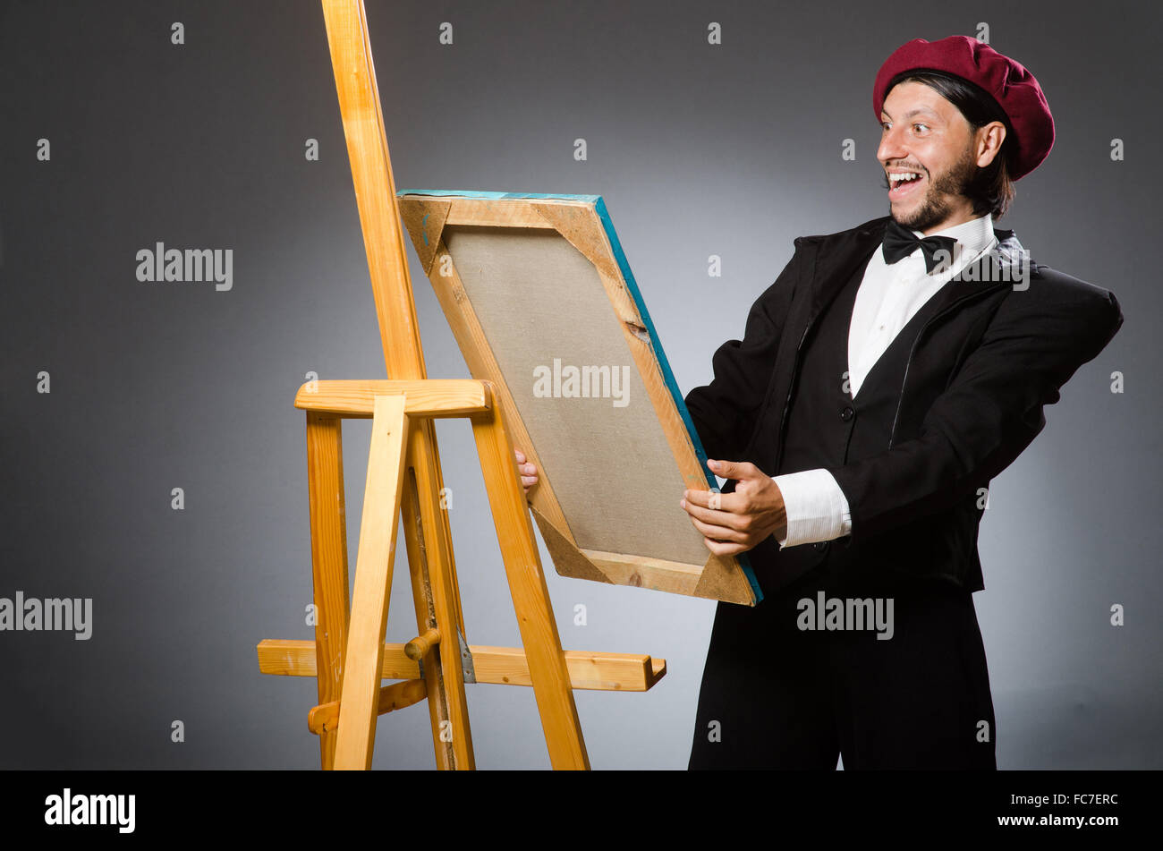 Funny artist working in the studio Stock Photo - Alamy