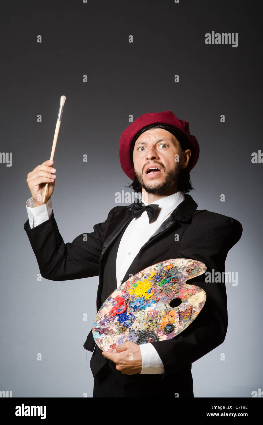 Funny artist working in the studio Stock Photo - Alamy
