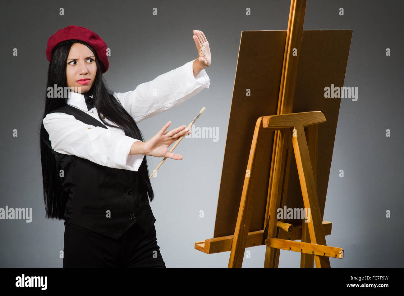 Funny artist working in the studio Stock Photo - Alamy