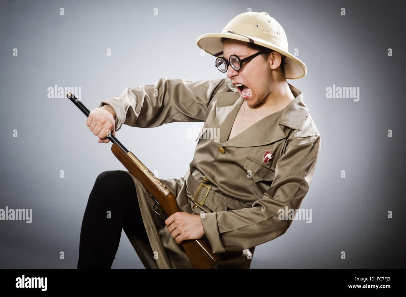 Funny hunter in hunting concept Stock Photo - Alamy