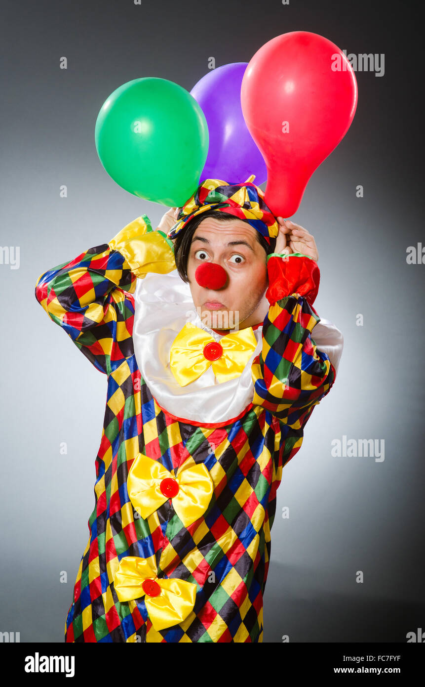 Funny clown in comical concept Stock Photo - Alamy