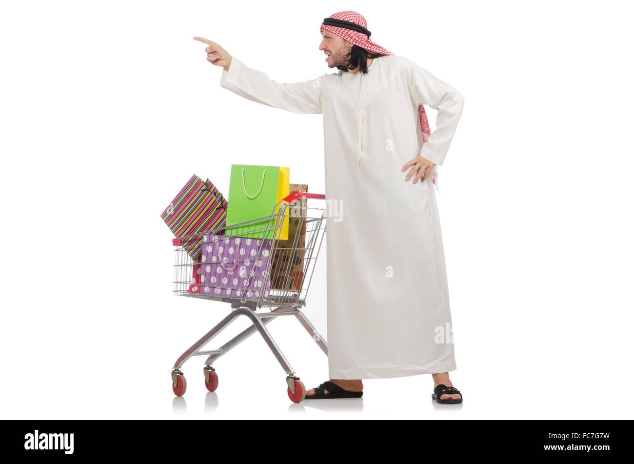 Arab man doing shopping isolated on white Stock Photo - Alamy