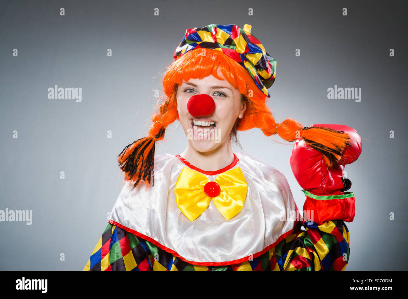 Funny clown in comical concept Stock Photo - Alamy