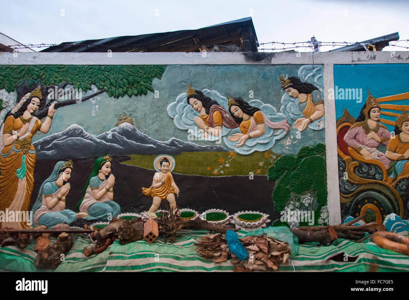 Mural of Buddhist figures painted on wall Stock Photo - Alamy