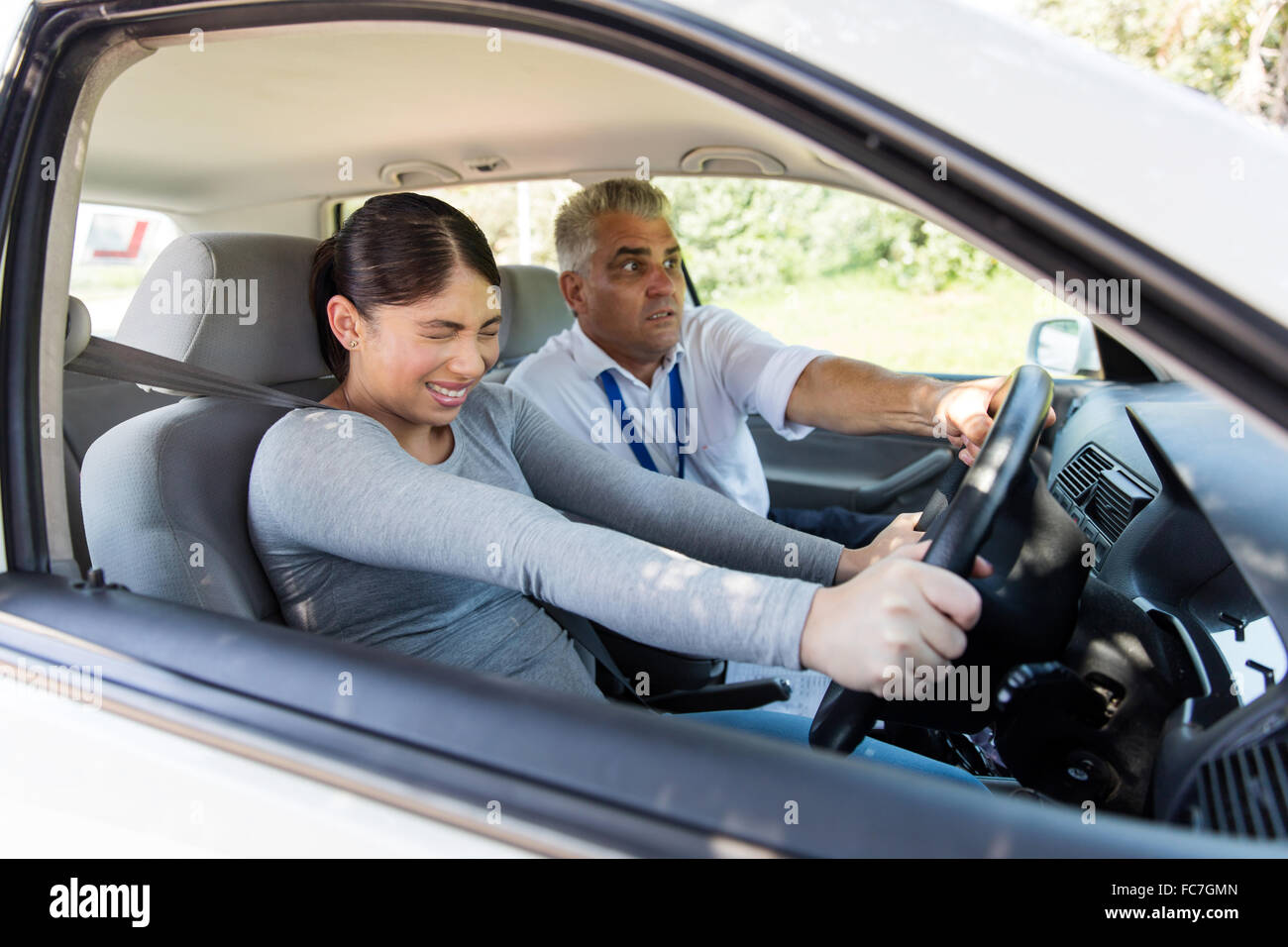 scared girl taking driving lessons for the first time Stock Photo - Alamy