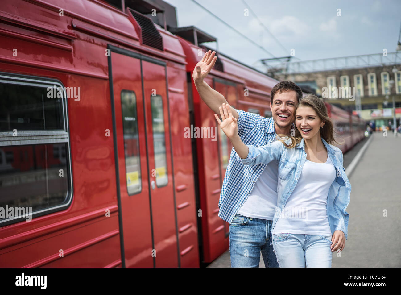 At the train station Stock Photo - Alamy