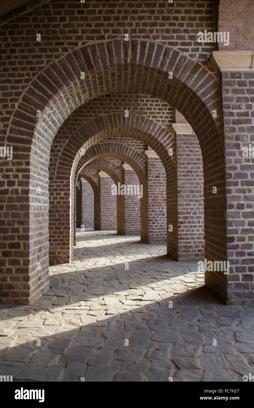 Brick archways in restored amphitheater Stock Photo - Alamy