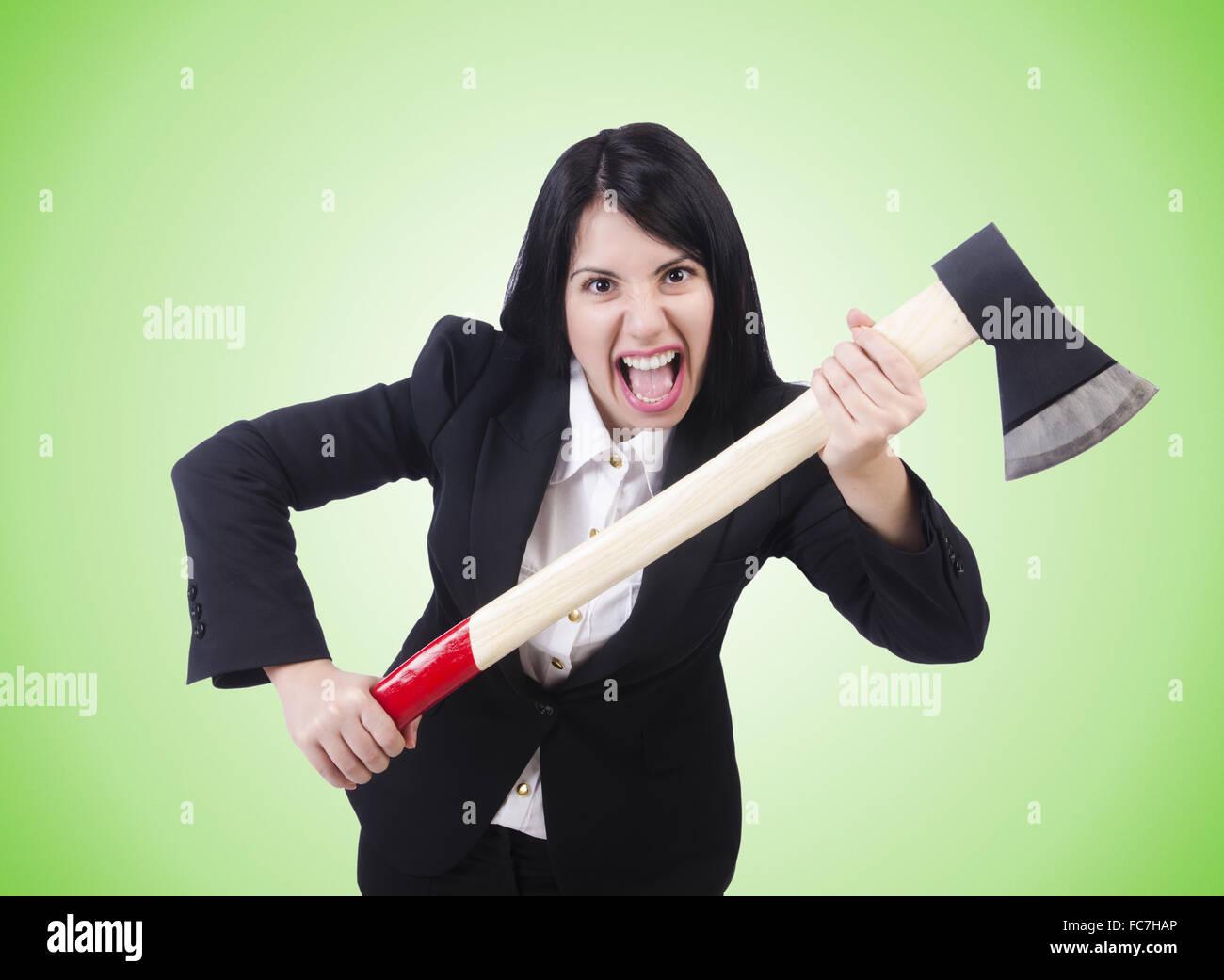 Angry businesswoman with axe on white Stock Photo - Alamy