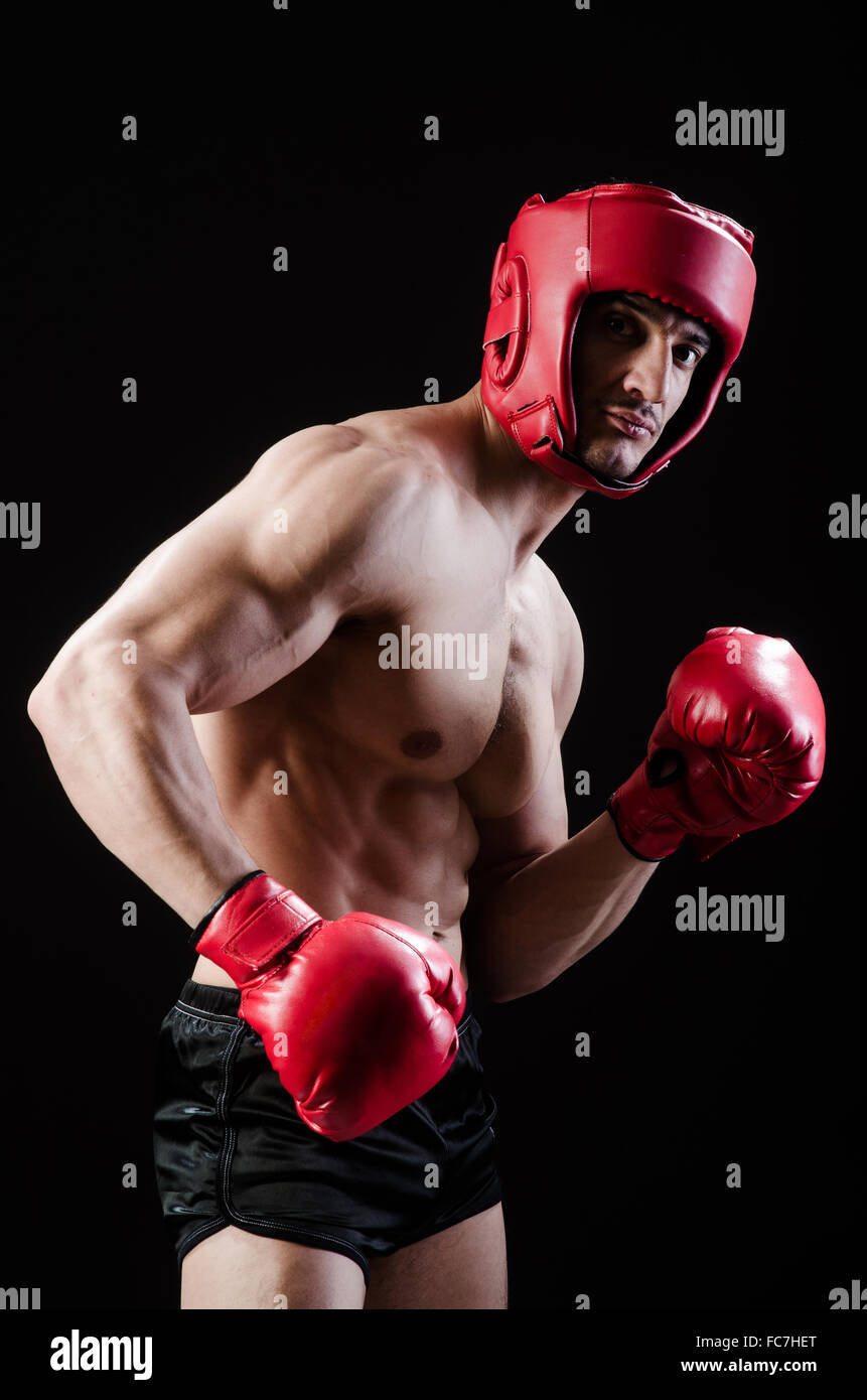 Muscular man in boxing concept Stock Photo - Alamy