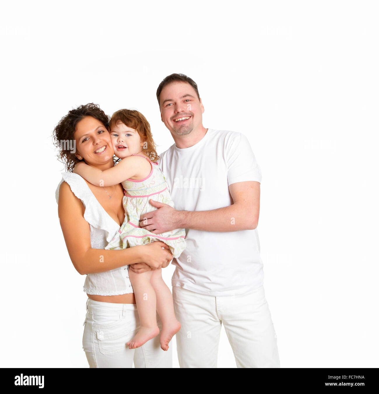 portrait of mother, father and their child together in studio Stock ...