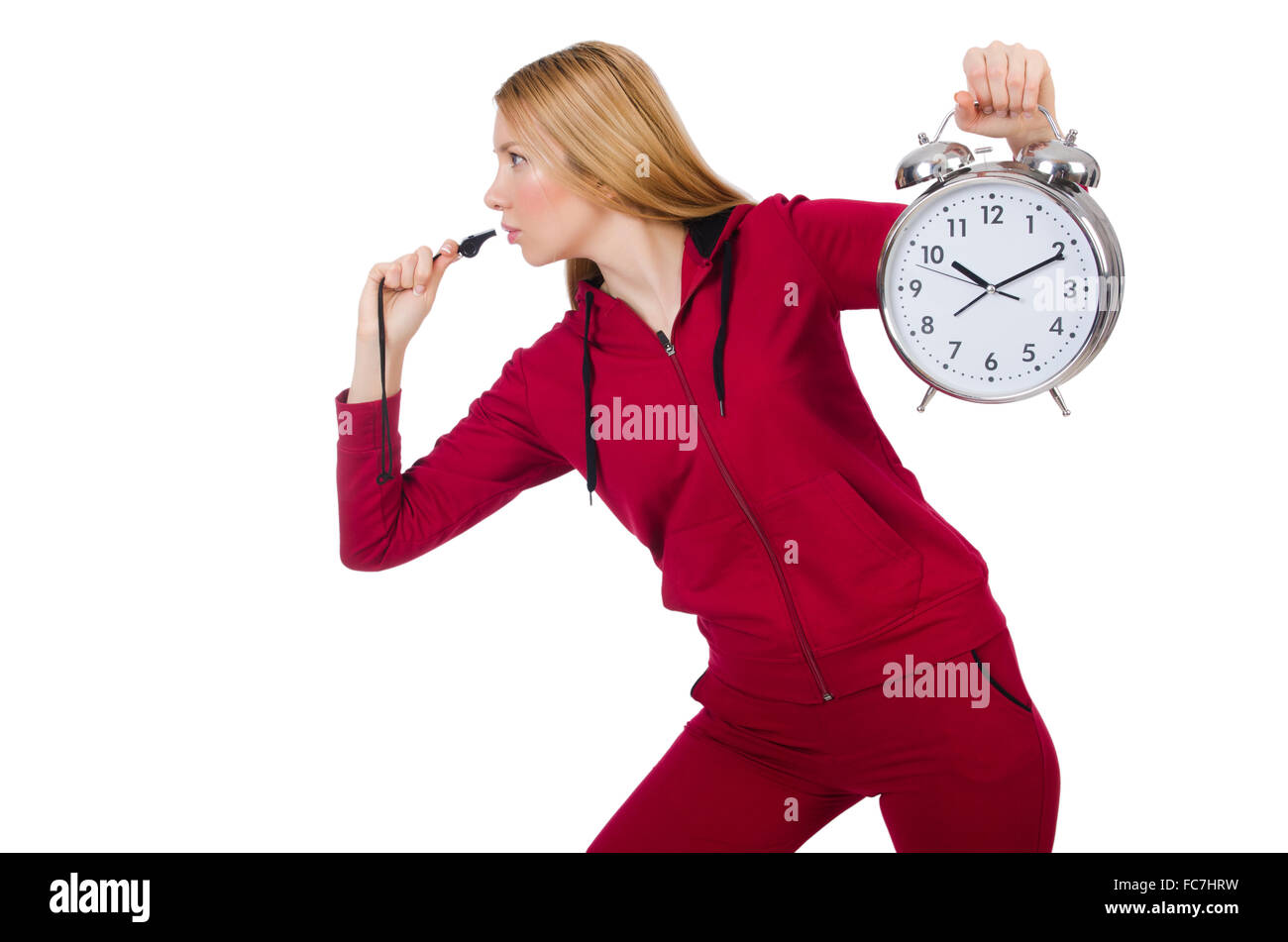 Pretty coach holding alarm clock isolated on white Stock Photo - Alamy