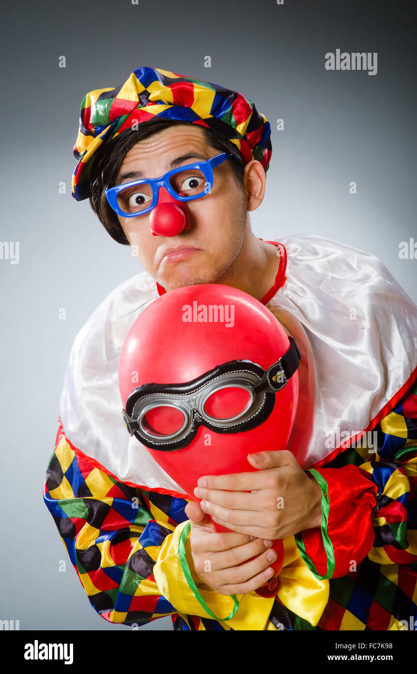 Funny clown in comical concept Stock Photo - Alamy