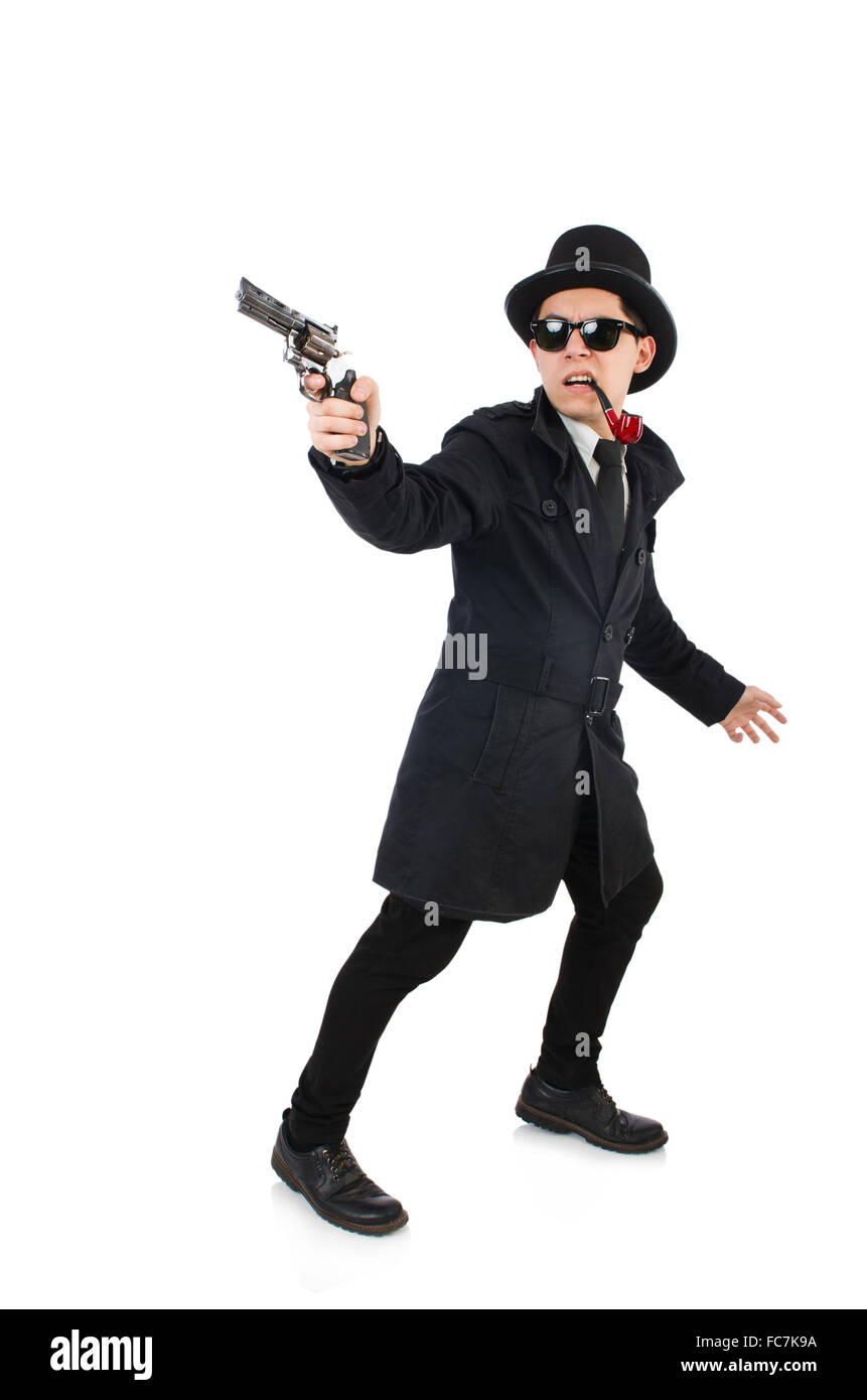 Young detective in black coat holding handgun isolated on white Stock ...