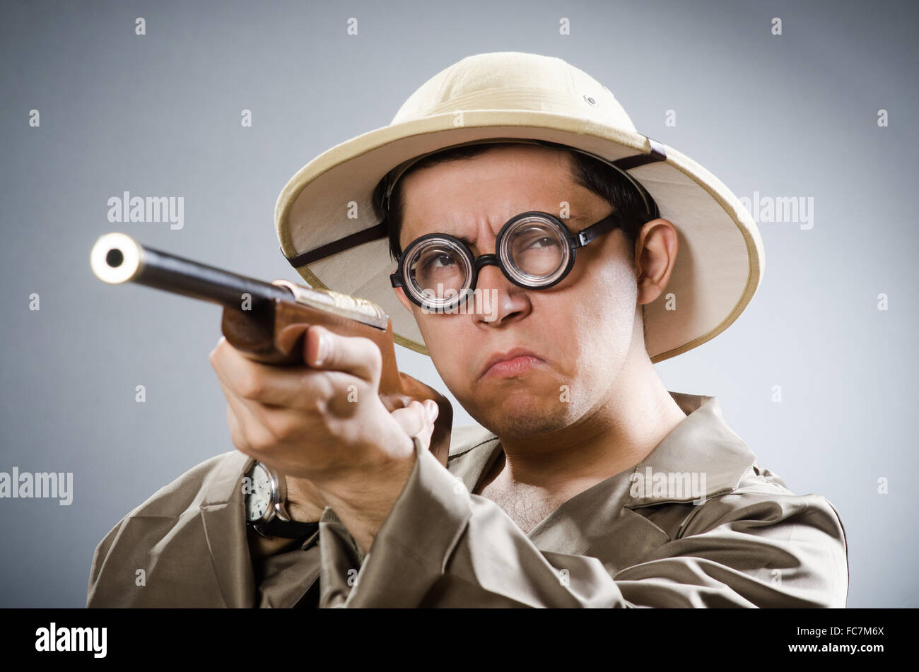 Funny hunter in hunting concept Stock Photo - Alamy