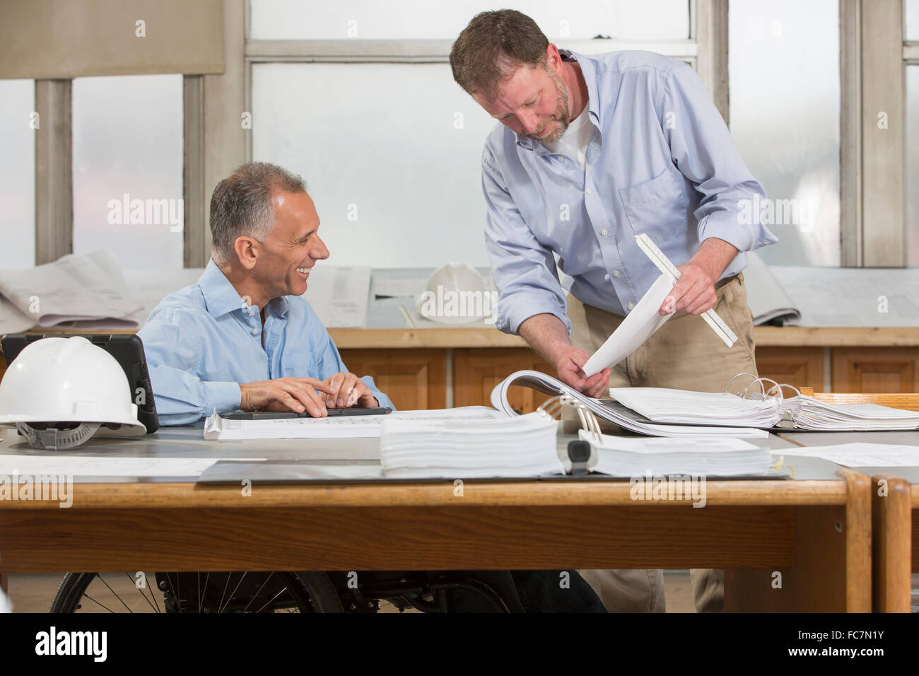 Two architects standing office hi-res stock photography and images - Alamy