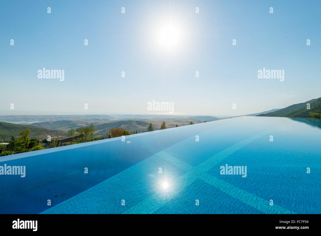 Infinity pool on the bright summer day Stock Photo - Alamy