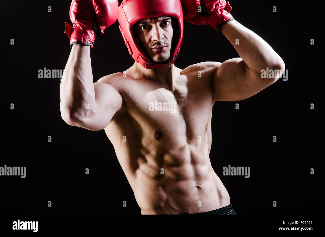 Muscular man in boxing concept Stock Photo - Alamy