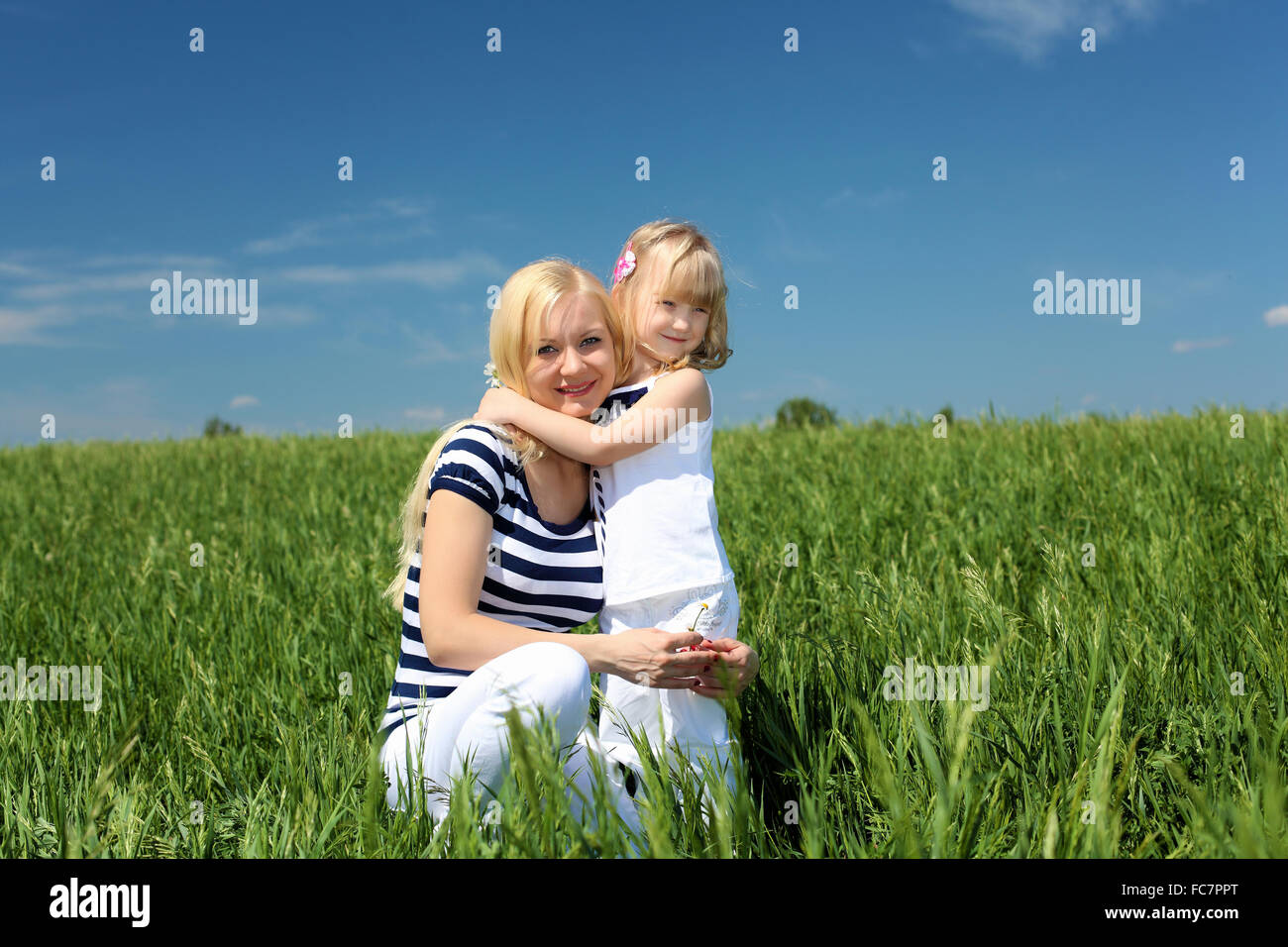 mother with her daughter outdoors in summer day Stock Photo - Alamy