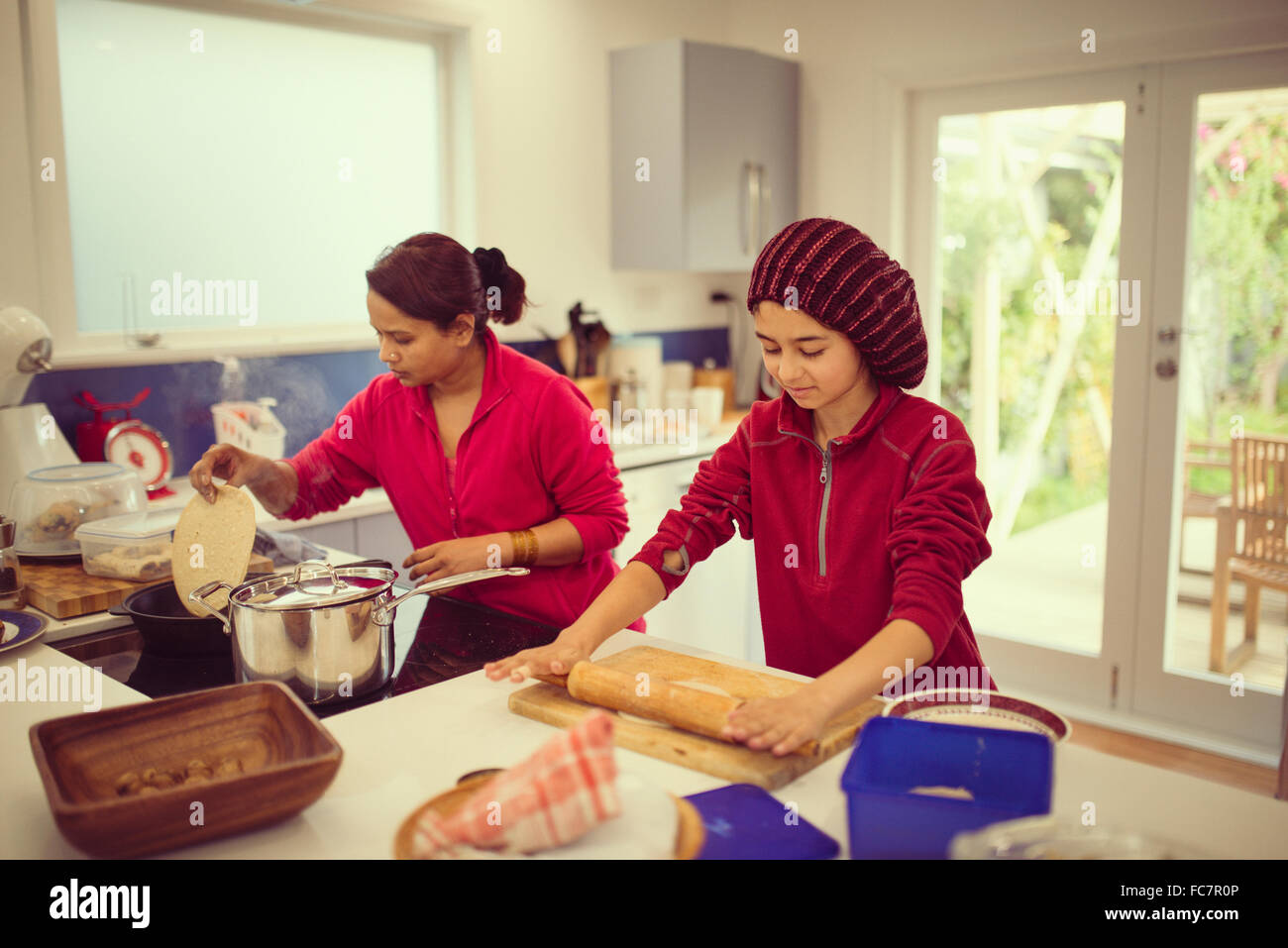 Indian woman cooking kitchen home hi-res stock photography and images ...