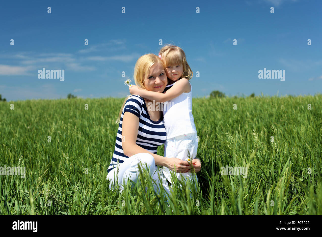 mother with her daughter outdoors in summer day Stock Photo - Alamy