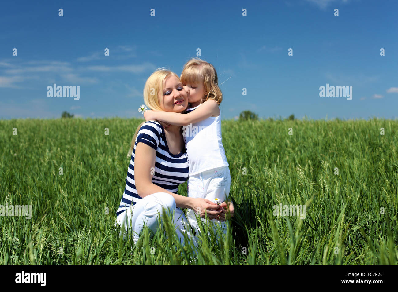 mother with her daughter outdoors in summer day Stock Photo - Alamy