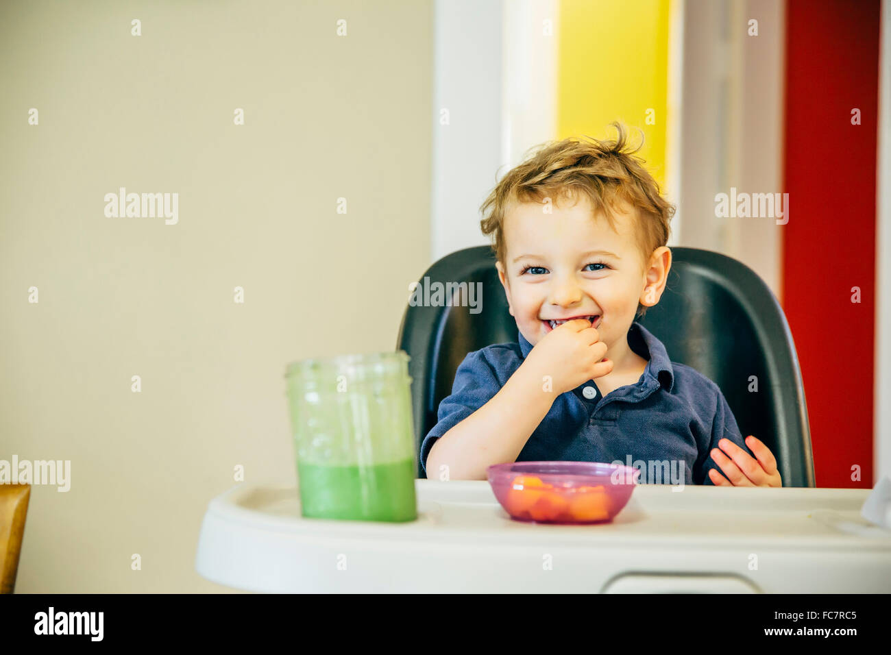 Boy chair eating hi-res stock photography and images - Alamy