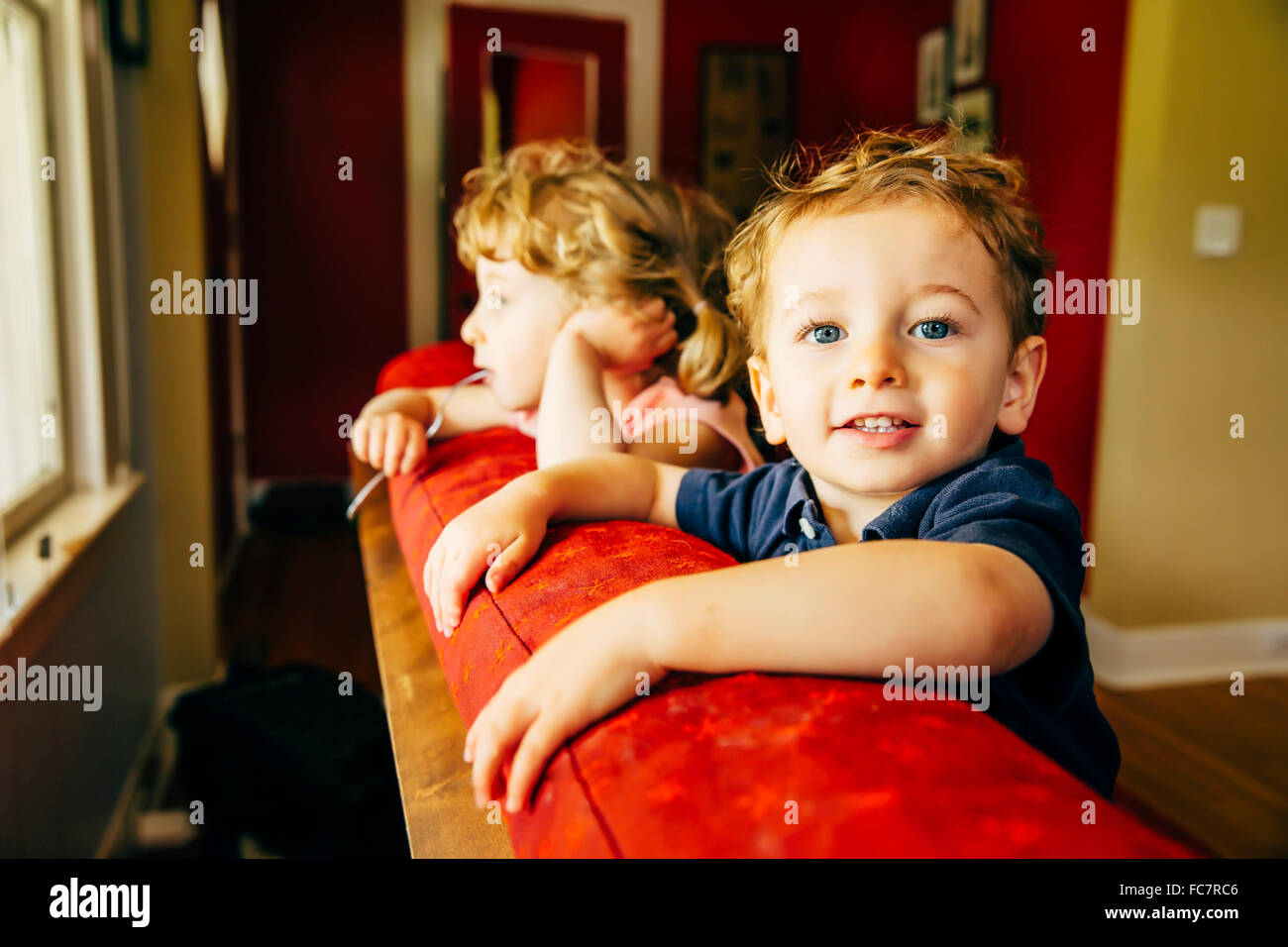 Child is standing on couch hi-res stock photography and images - Alamy