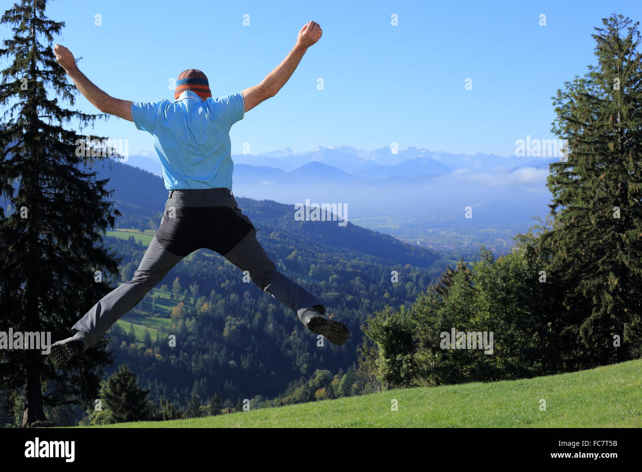 Jumping man leadership freedom hi-res stock photography and images - Alamy