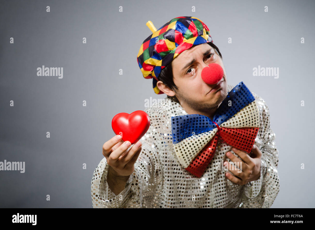 Funny clown with red nose Stock Photo - Alamy